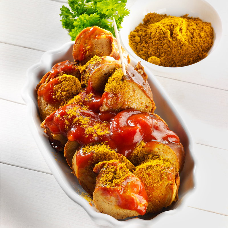 Currywurst für zwei in würziger Sauce | Schrader Genussversand